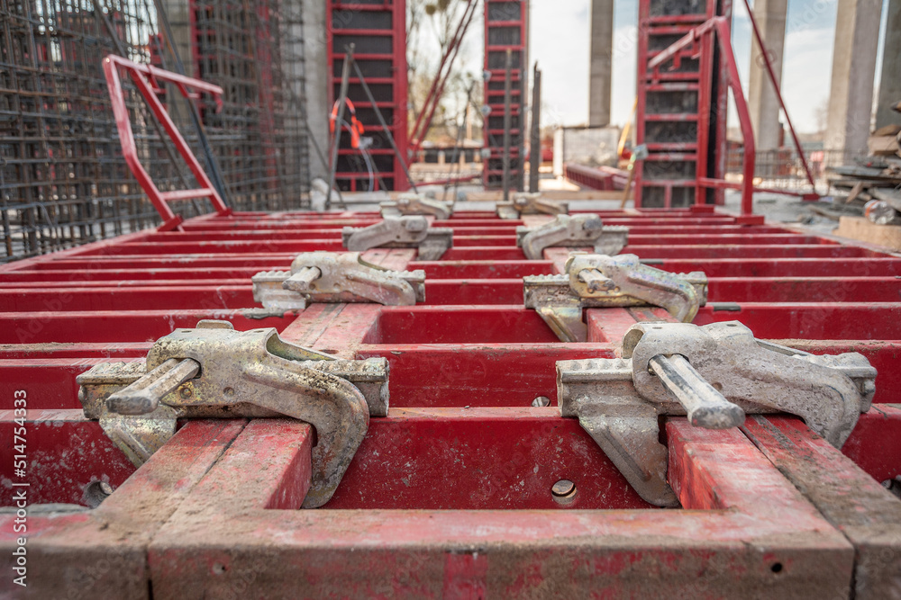 The clamp connects two panels of columns. Stock Photo | Adobe Stock