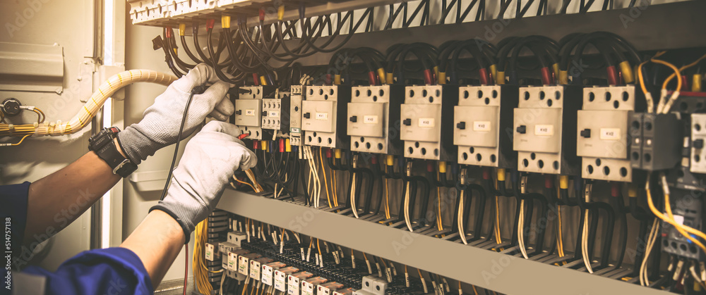 Electricity and electrical maintenance service, Engineer hand holding ...
