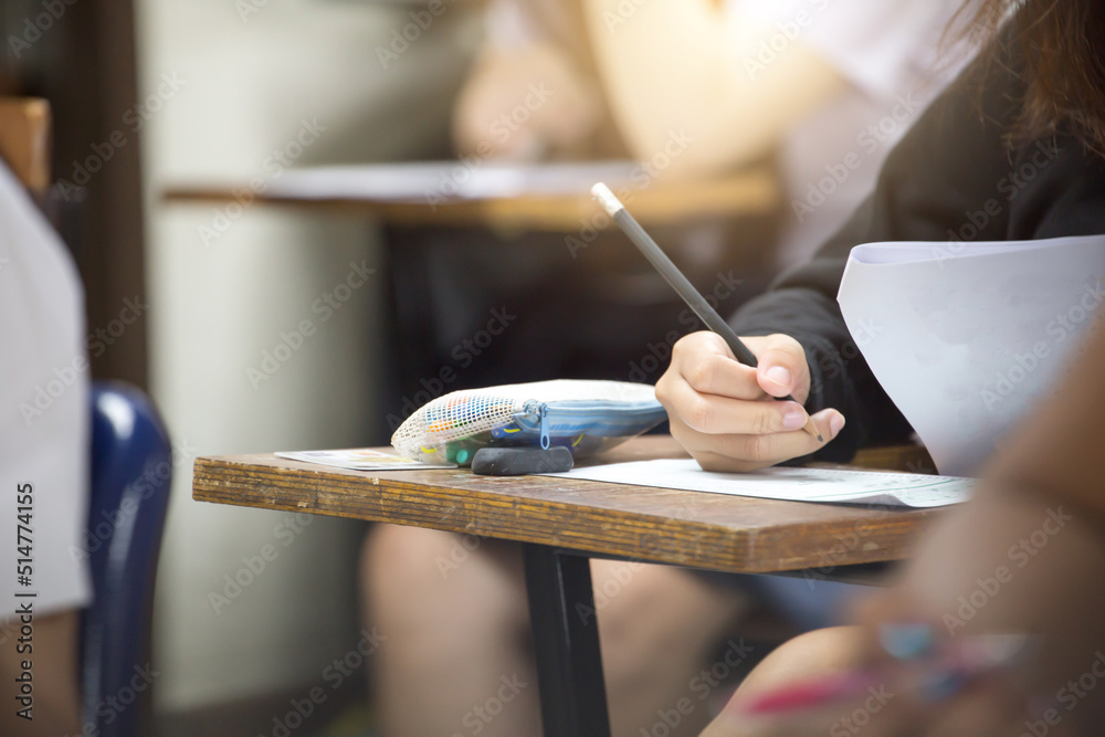 high school,university student study.hands holding pencil writing paper ...