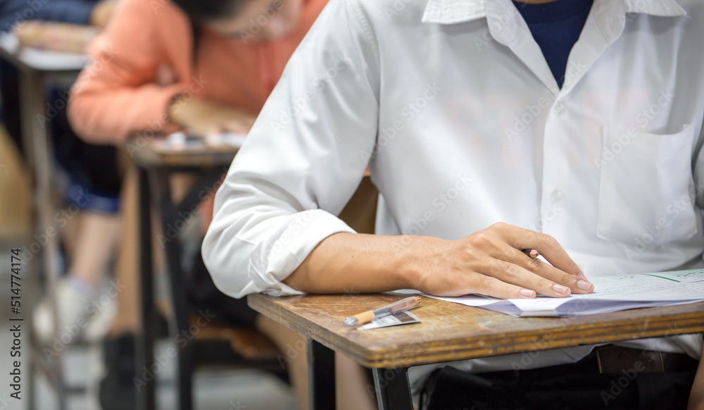 high school,university student study.hands holding pencil writing paper ...