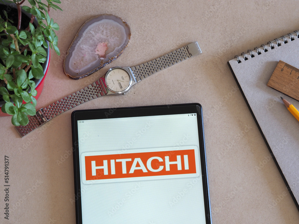 In this photo illustration Hitachi Ltd. logo seen displayed on a tablet ...