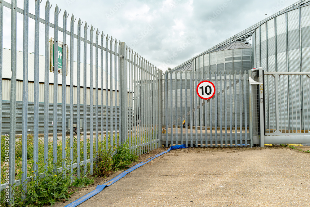 10 maps speed limit sign seen at the entrance to a grain silo storage ...