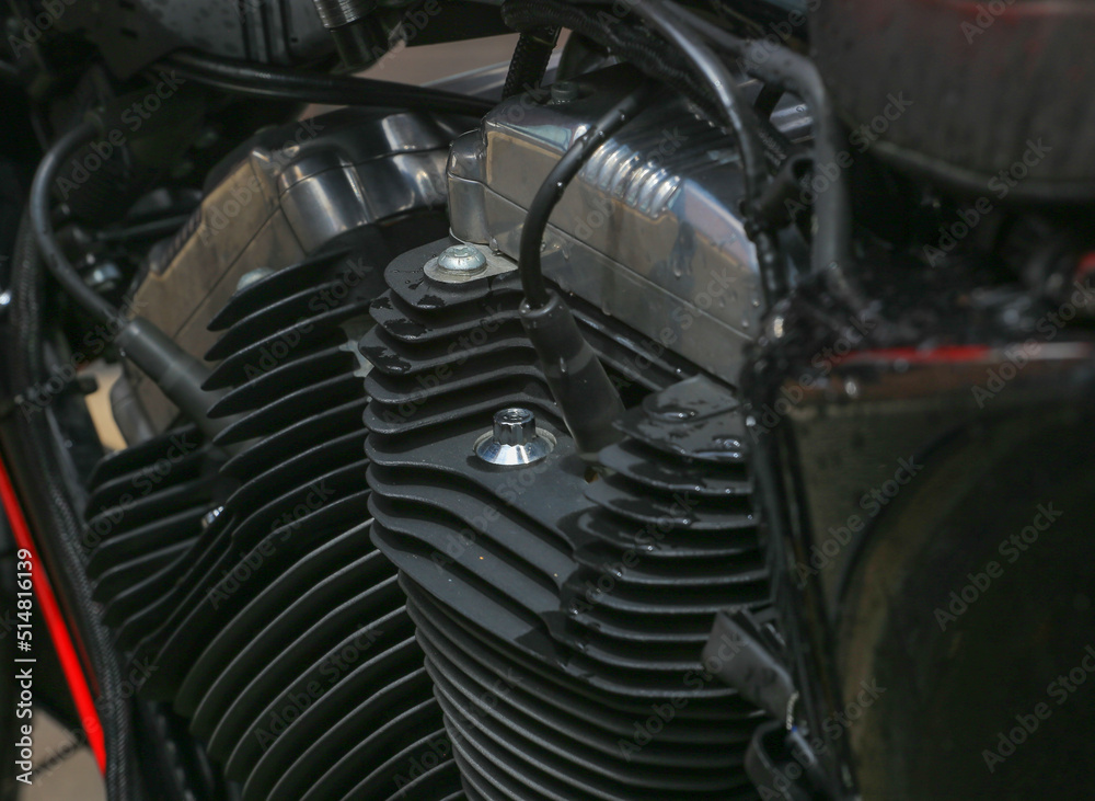 Modern motorcycle engine, close up view, toned. Cylinders and a spark ...