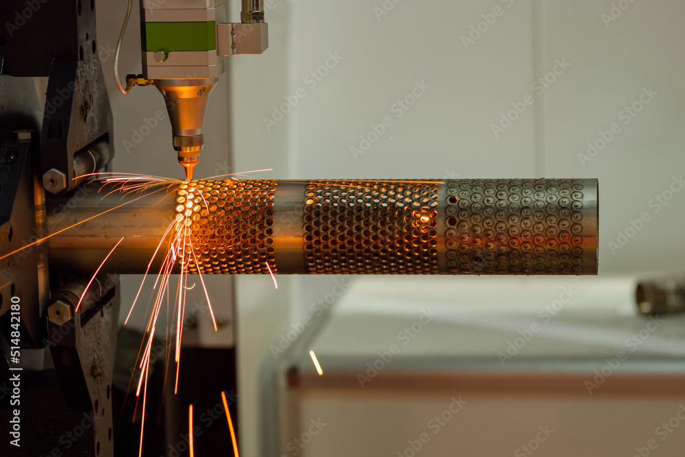 Poster CNC laser cutting machine working with cylindrical metal ...