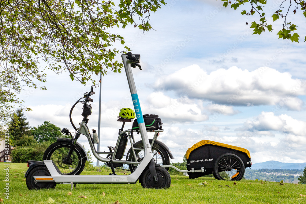 Everett, WA - USA -06-04-2022: Electric Scooter, and E-Bike with Cargo ...