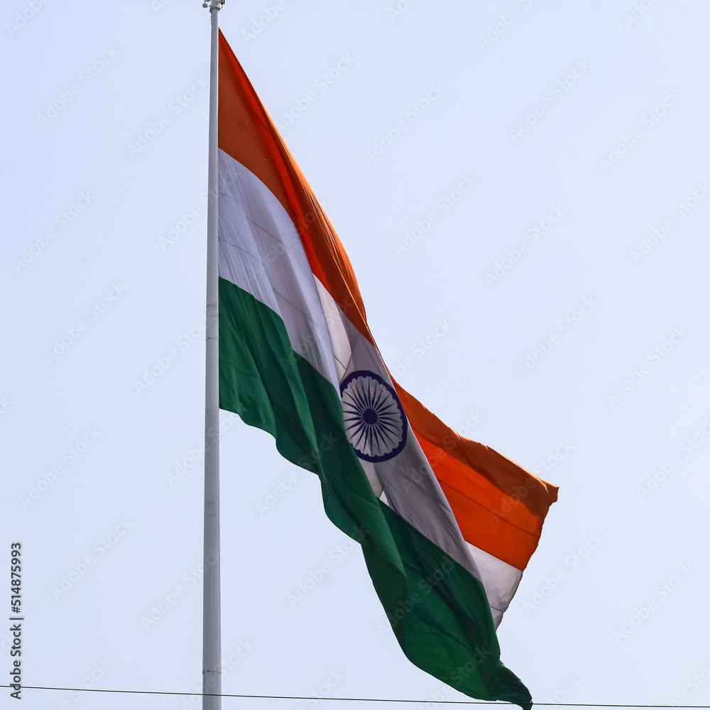 India flag flying high at Connaught Place with pride in blue sky, India ...
