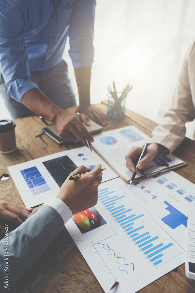 Meeting concept Business team hands at working with financial plan ...