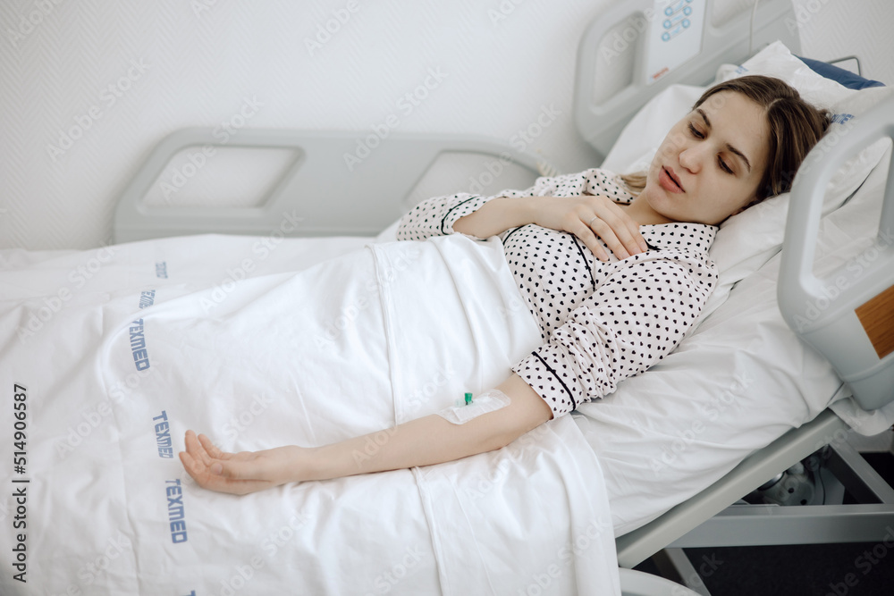 infusion treatment, a women is being treated . Stock Photo | Adobe Stock