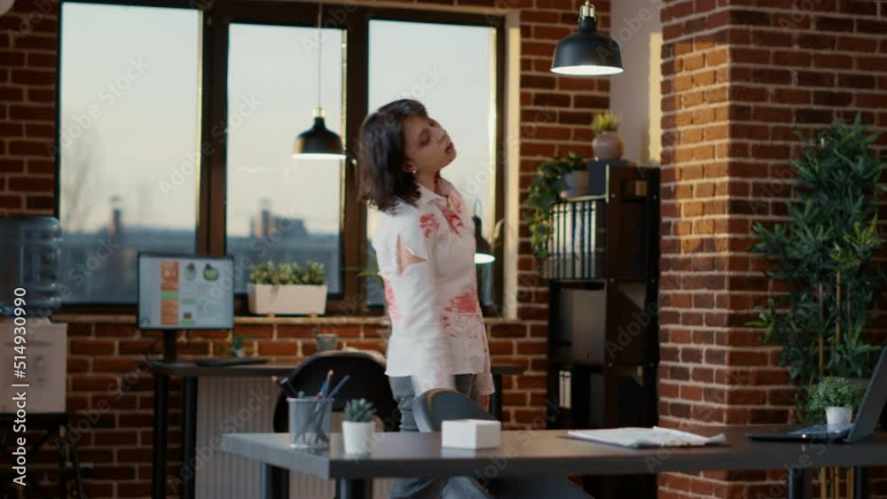 Creepy horror looking zombies wandering around office workplace while ...