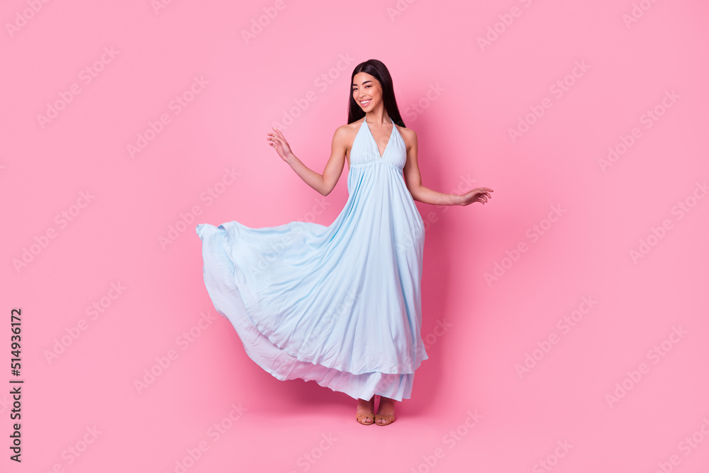 Full body photo of adorable rich woman with flying long satin dress ...