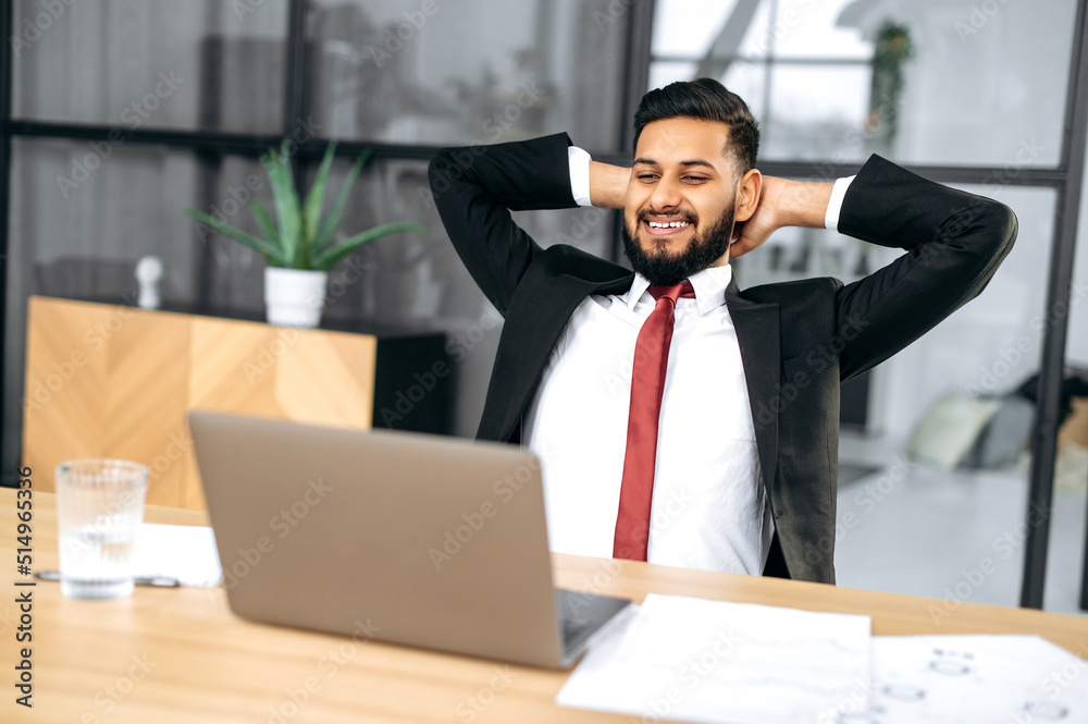 Relaxed calm indian or arabian business man, top manager, chilling at ...