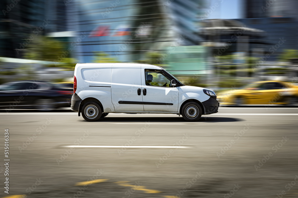 Renault Kangoo 2021 model LCV rides on the city road. White delivery ...
