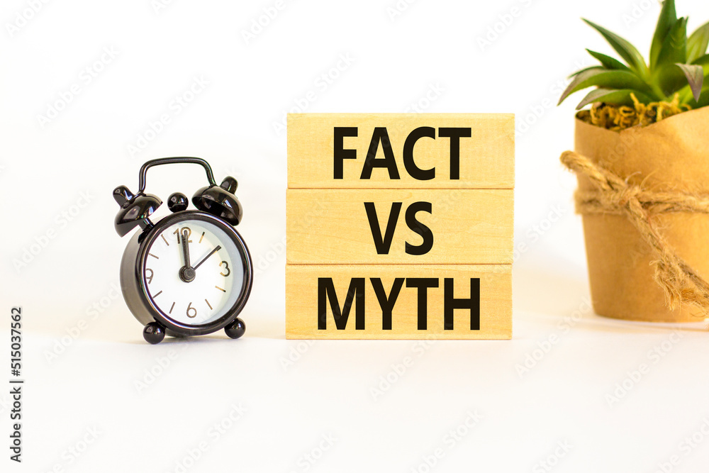 Fact vs myth symbol. Concept words Fact vs myth on wooden blocks on a ...