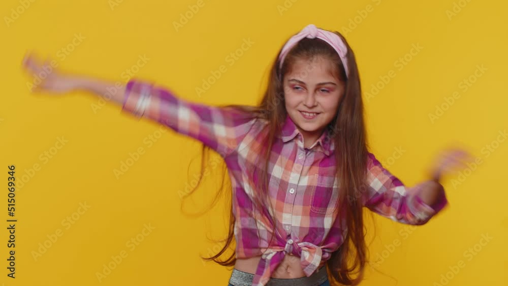 Trendy cheerful positive young preteen child girl kid having fun ...