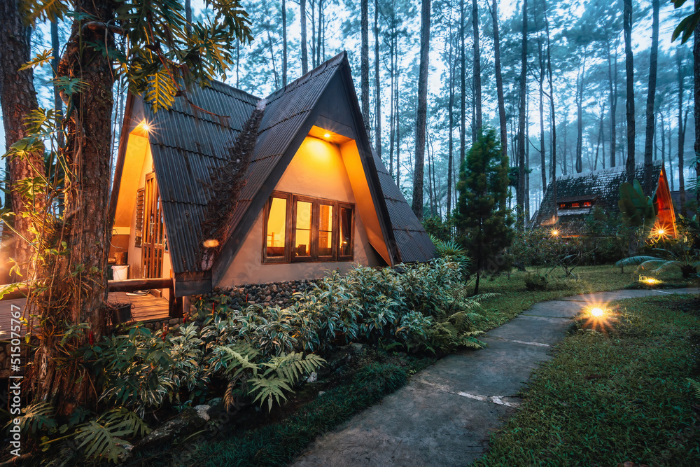 Pinewood cabin in pine forest green on nature trail. Wooden house or ...