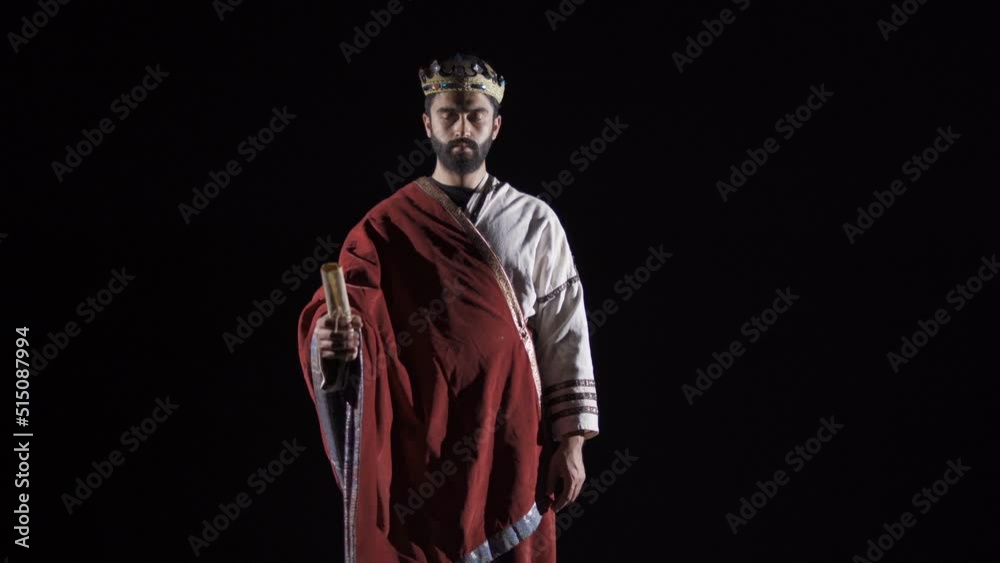 King of Rome in antiquity. Black background. The Roman King turns ...