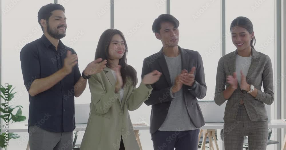 Happy group of people at congratulation speech of business conference ...