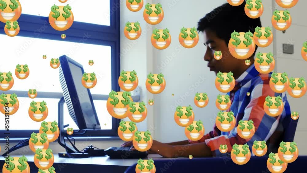 Multiple money eyes face emojis floating over indian boy using computer ...