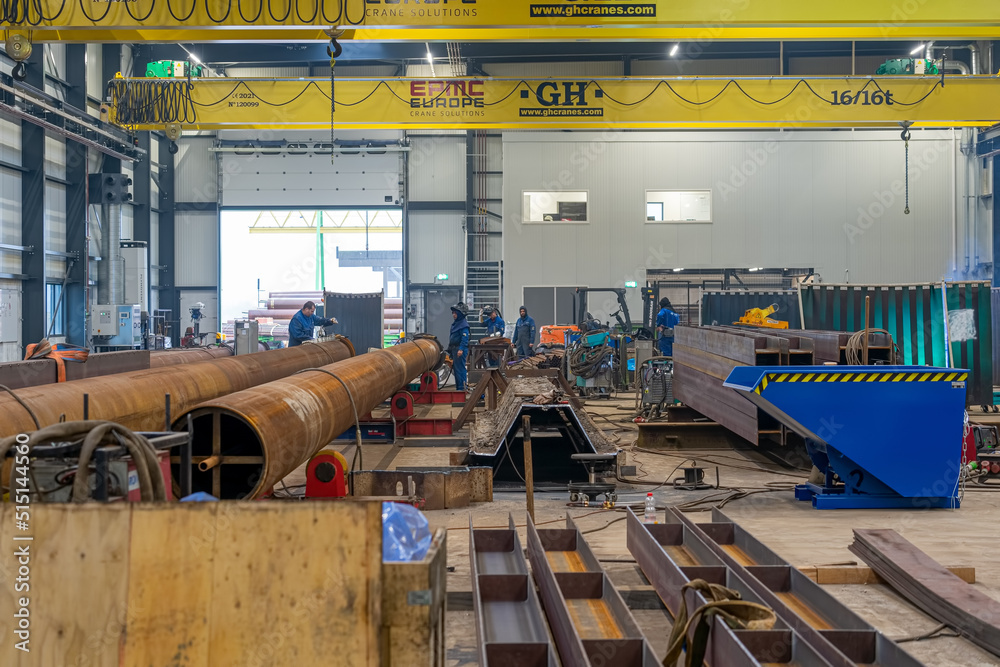 Interior of a steel factory with steel posts and beams and where ...
