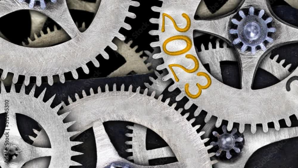 Stockvideon Rotating tooth wheel with New Year 2023 and group of wheels ...