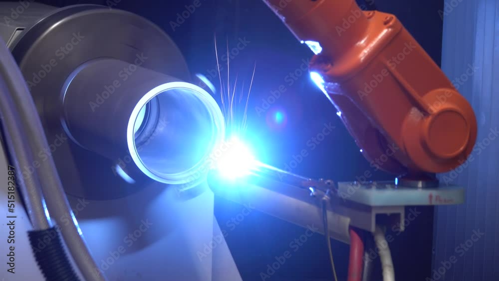 Automatic industrial robotic welding machine that applies coatings to ...