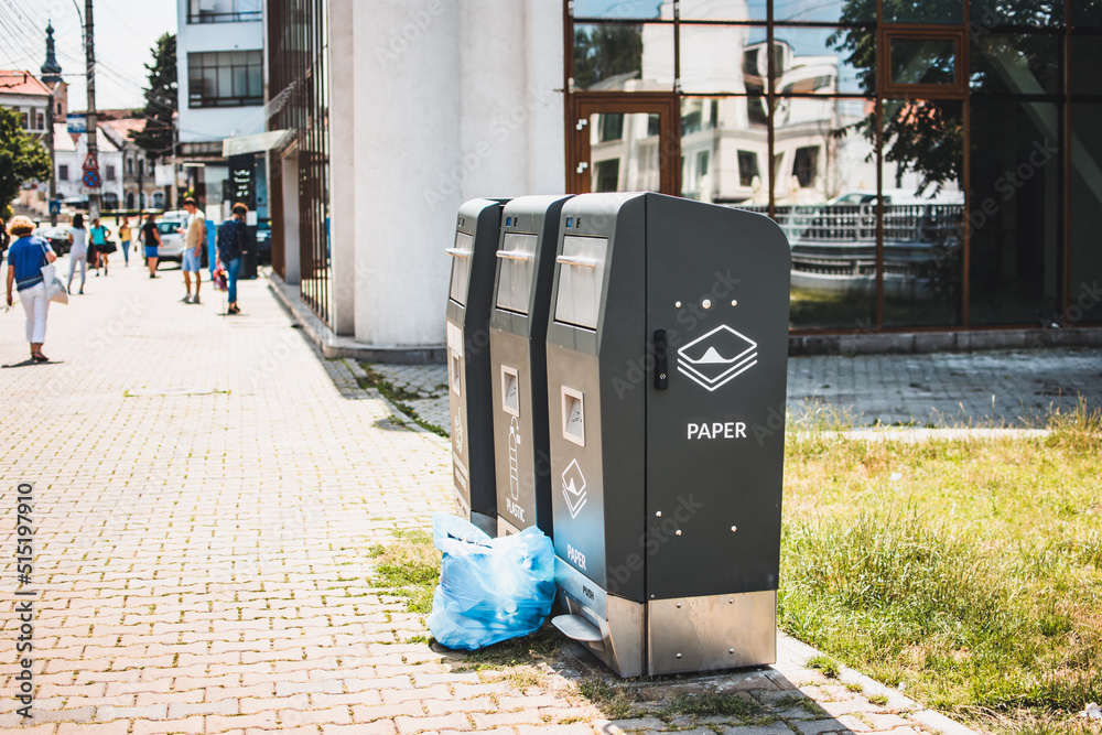 Smart metallic trash bins in town or urban area to sort different types ...