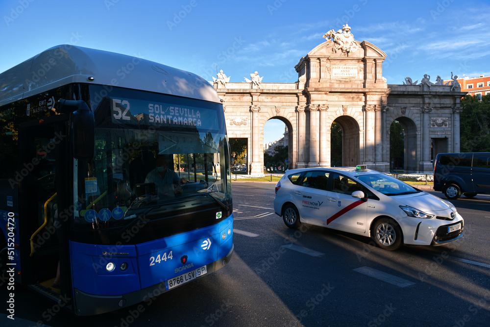 Electrical hybrid Mercedes public transportation bus in the morning on ...