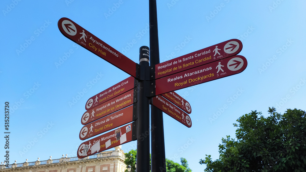 Foto de Sevilla, Spain, September 12, 2021: Sign post indicating the ...