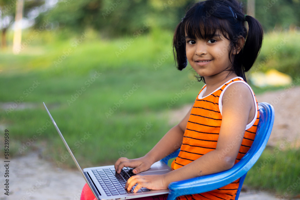child girl student using internet at outdoor Stock Photo | Adobe Stock