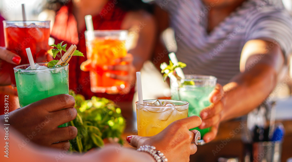 Happy people cheering with mojito and having fun - Multiracial friends ...