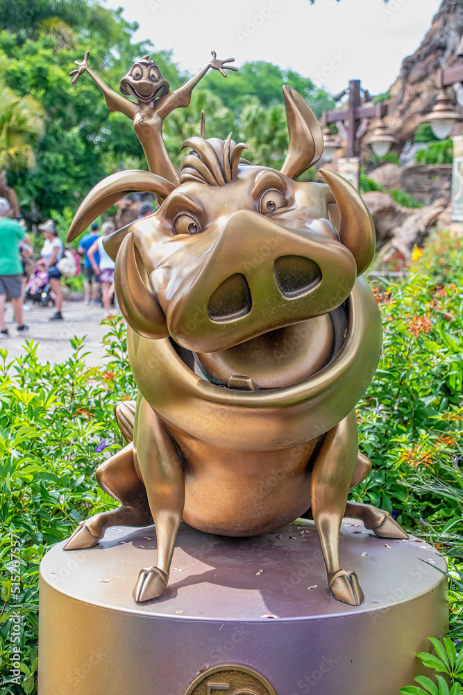 Timon and Pumbaa Gold Statue 50th Anniversary Disney Stock Photo ...