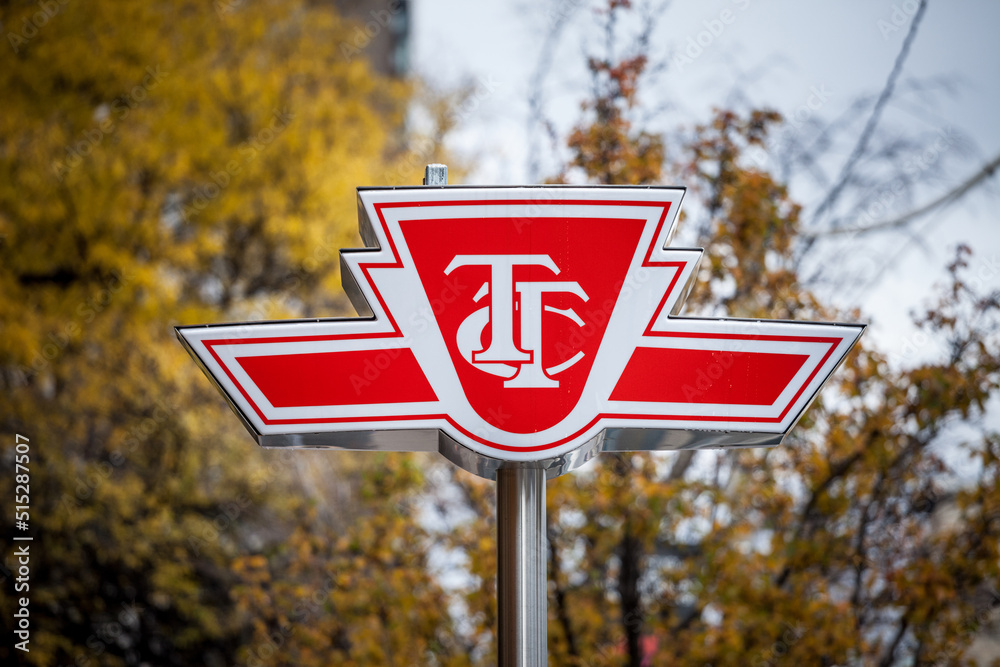 TORONTO, CANADA - NOVEMBER 13, 2018: TTC logo on the entrance of a ...