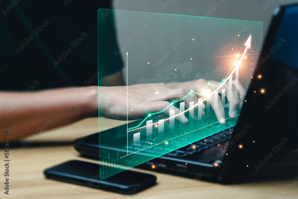 Fotka „Businessmen plan their business finances to grow in the future ...