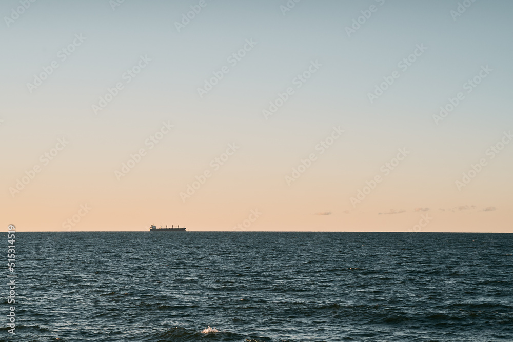 Distant ship over horizon. Commercial vessel in the Baltic Sea Stock ...