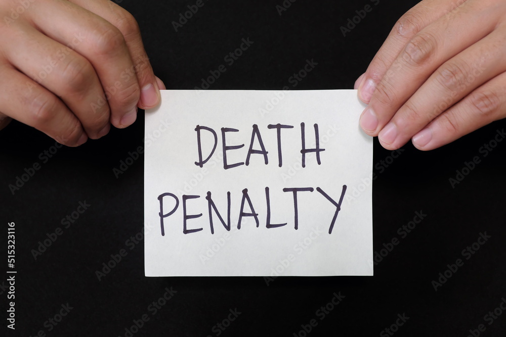 Death penalty sentence concept. Criminal hands holding paper placard ...