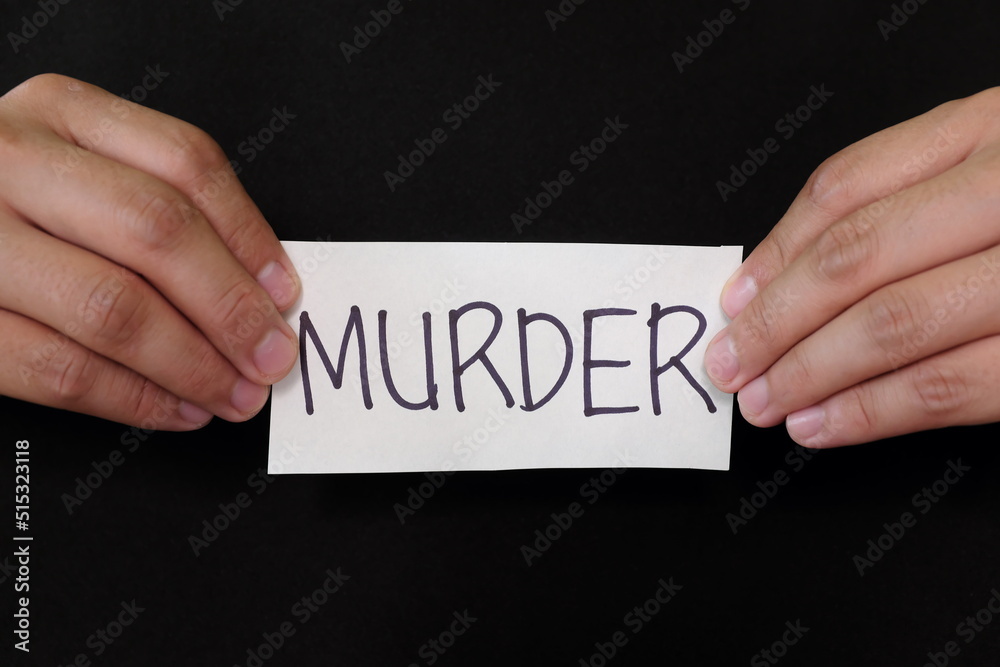 Murder case mug shot concept. Criminal hands holding paper placard with ...