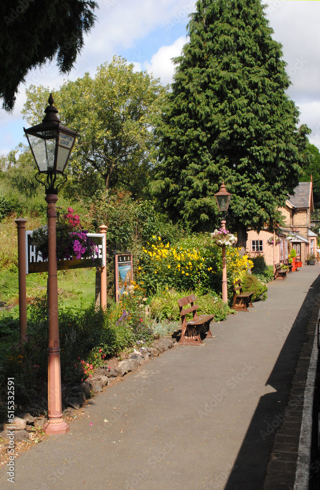 Vintage Lamppost and Colourful Flowers on Platform of Rural Railway ...