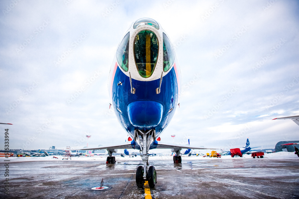Airplane front fuselage with navigators cabin. Aircraft on runway of ...