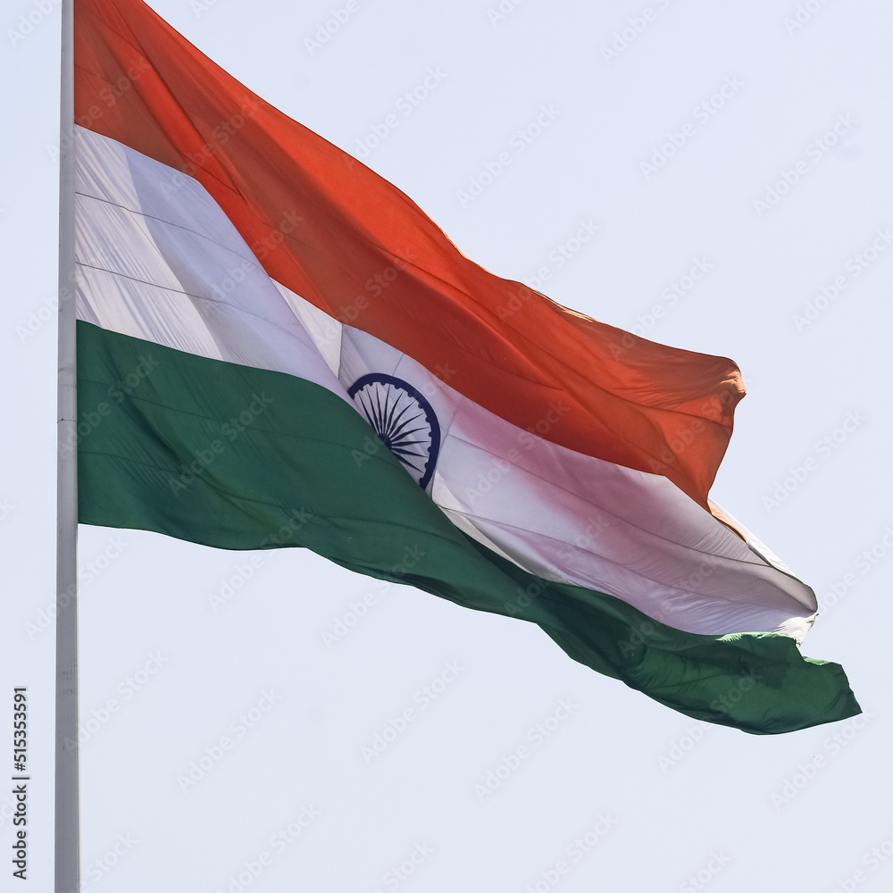 India flag flying high at Connaught Place with pride in blue sky, India ...