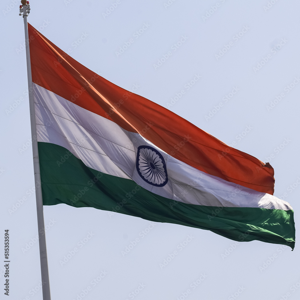 India flag flying high at Connaught Place with pride in blue sky, India ...