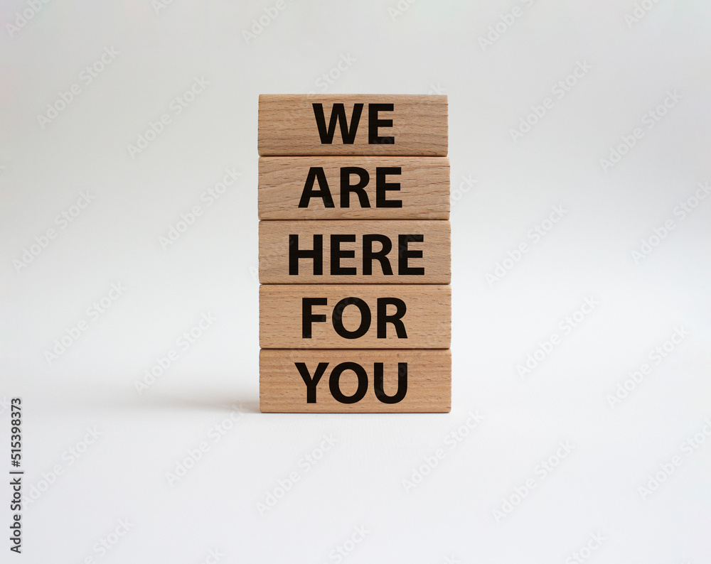 Help symbol. Wooden blocks with words 'We are here for you'. Beautiful ...