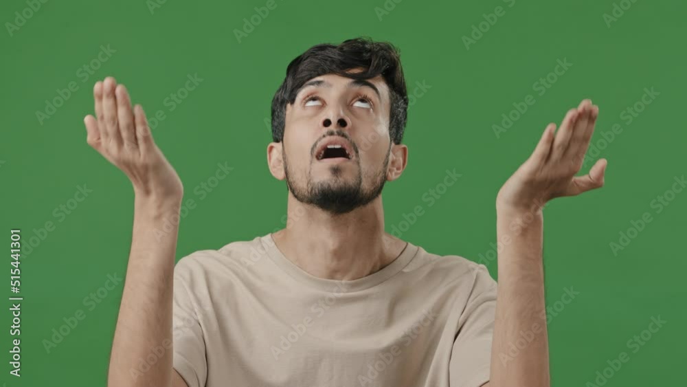 Portrait of hopeful arabic hispanic brunet adult man want blessing ...