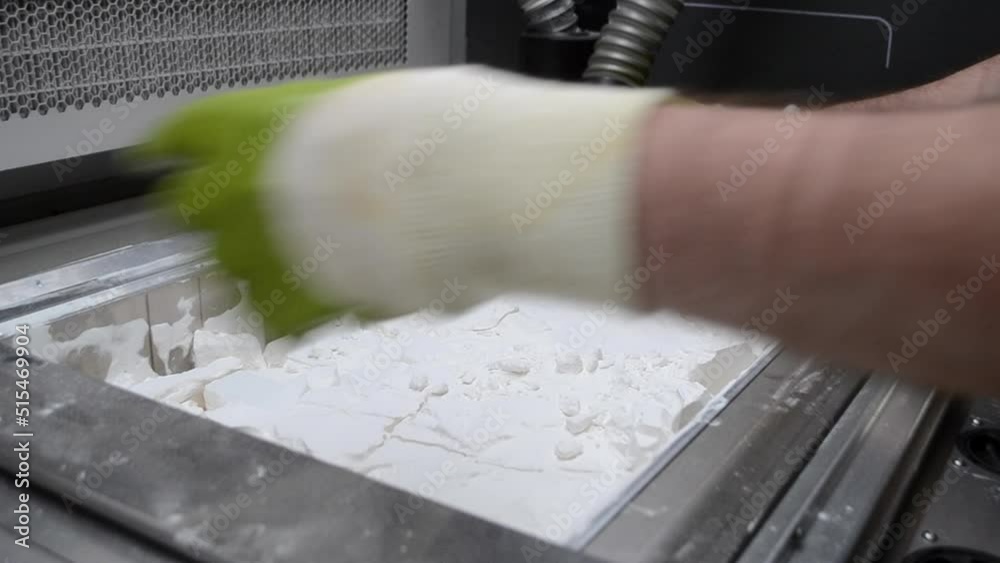 Engineer or artist designer printing 3D parts and shaping models from ...