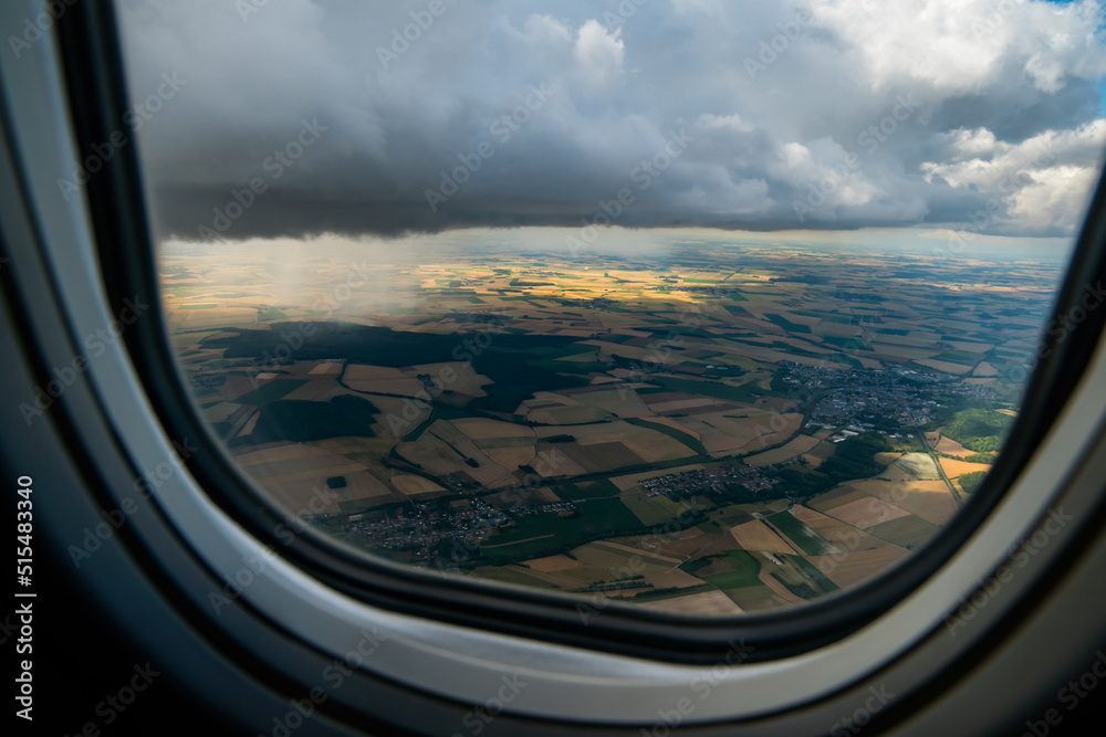 flying and traveling, view from airplane window on the wing. View ...