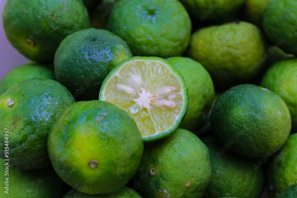 Top view of Lime or Limau (Citrus amblycarpa) slice with a large group ...