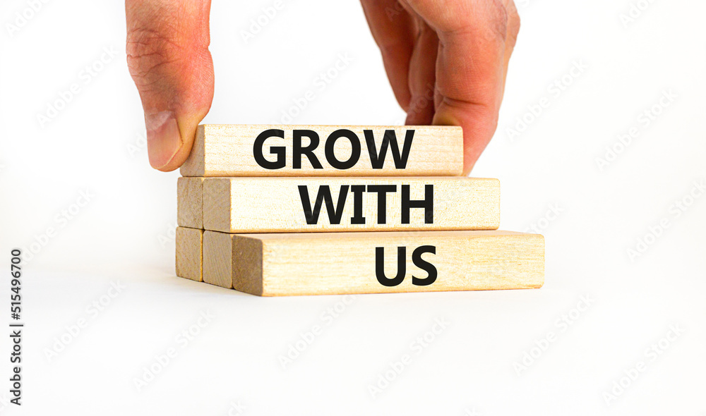Grow with us symbol. Concept words Grow with us on wooden blocks on a beautiful white table ...