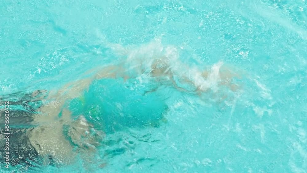 Little girl learning to swim with mother in big sport pool. Swimming ...