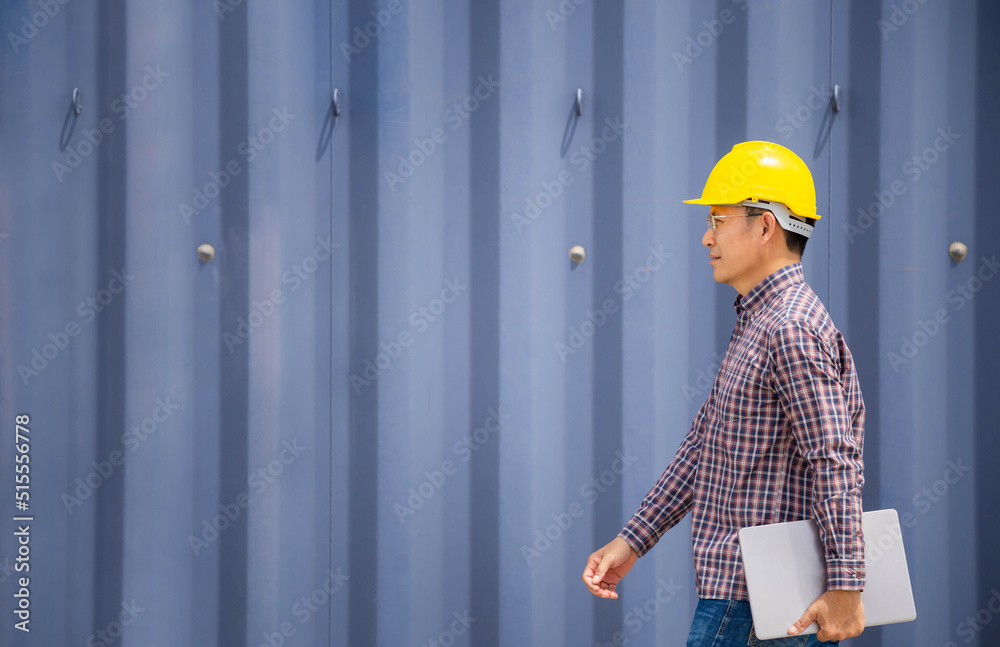 Photo & Art Print Engineer walking in shipping container yard, Dock ...