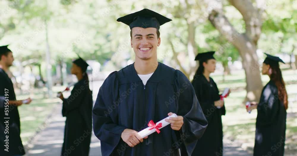 Portrait of a university student at a graduation ceremony outdoors ...