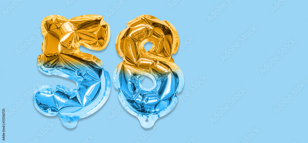 Fotografia do Stock: Rainbow foil balloon number, digit fifty eight on ...
